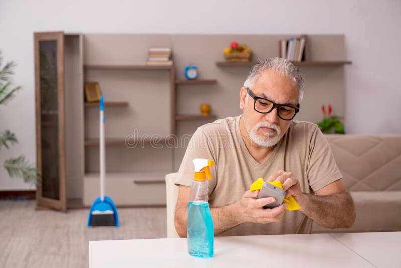 Old Man Doing Housework at Home Stock Image - Image of service, aged ...