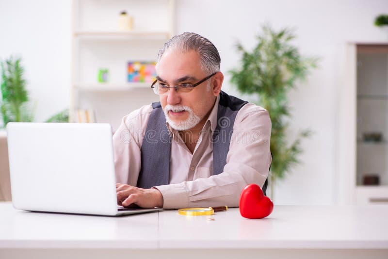 Old Man Doing Marriage Proposal Via Internet Stock Image - Image of ...