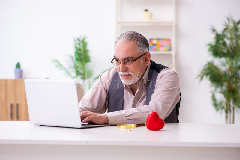 Old Man Doing Marriage Proposal Via Internet Stock Photo - Image of ...