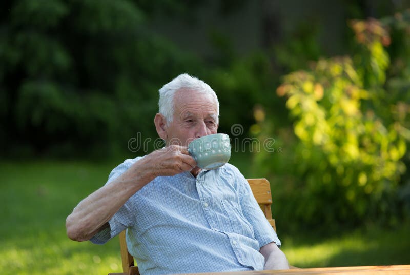 Old Man Drinking Tea in Garden Stock Photo - Image of outdoors, green ...