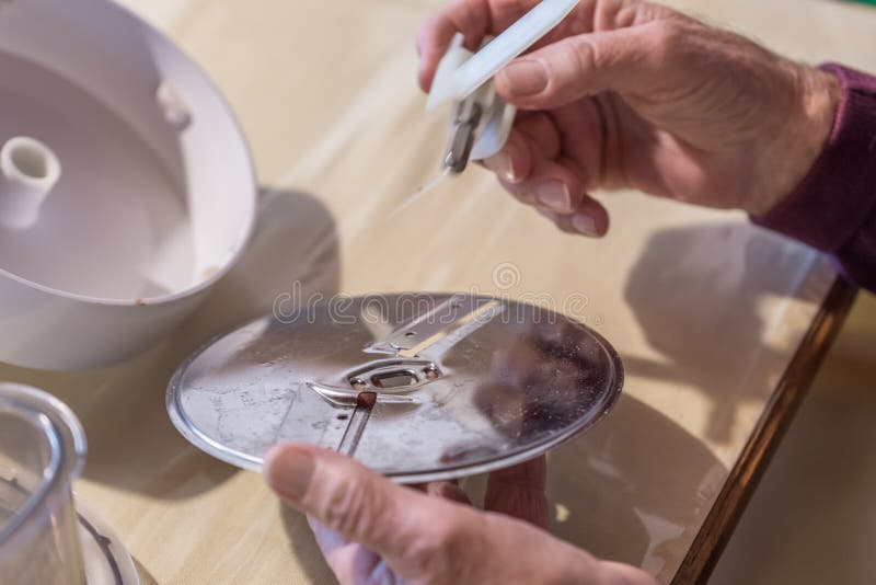Old Man Grandpa with Hands Builds Assembled Disassembles a Kitchen ...