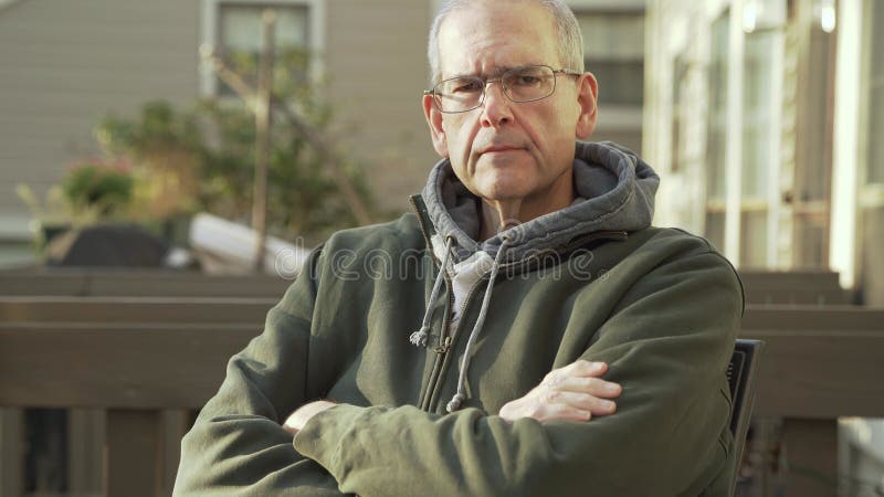 Old man staring at camera stock footage. Video of lifestyles - 262204036