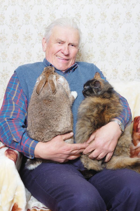 Old man hold animal stock photo. Image of mature, cheerful - 7828194