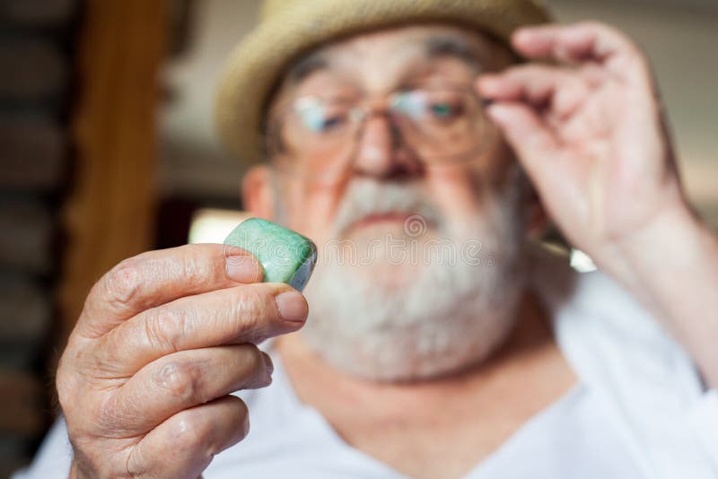 Old Man Inspecting Precious Stone Stock Photos - Free & Royalty-Free ...