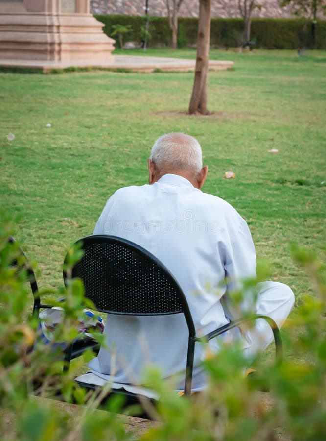 Old Man Sitting Alone at Iron Chair at Park from Back at Evening Stock ...