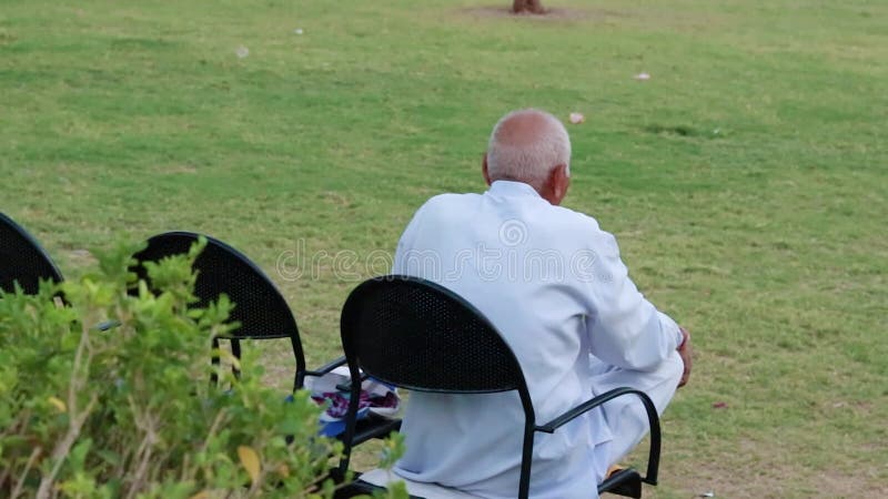 Old Man Isolated Sitting Alone at Iron Chair at Park from Back at ...