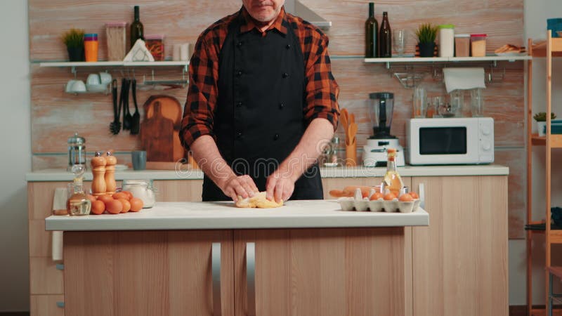 Old Man with Kitchen Apron Cooking Bread Stock Video - Video of falls ...