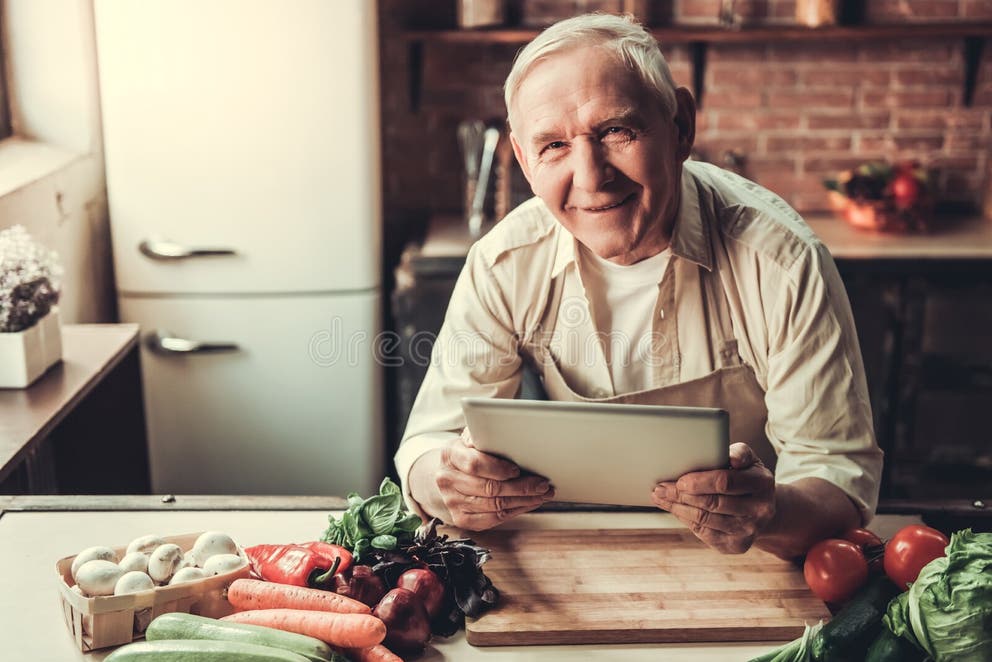 Old man in kitchen stock image. Image of green, male - 97136505