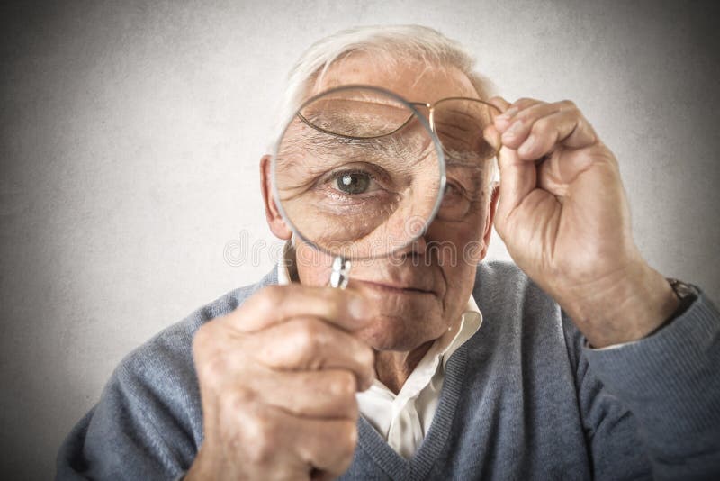 Old Man Looking through a Hand Lens Stock Photo - Image of control ...