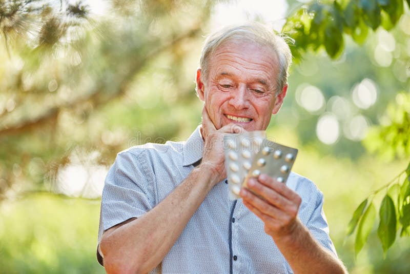 Old Man with Medicine in Nature Stock Image - Image of medicament ...