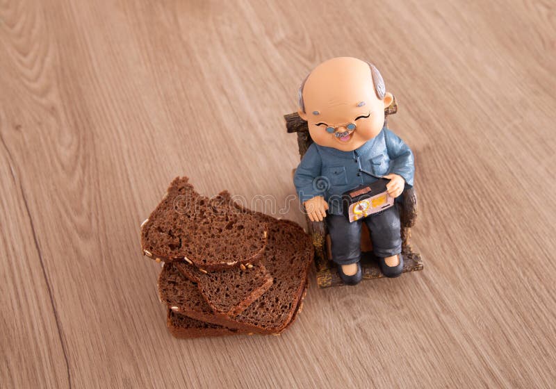 Old Man Model and Slices of Bread Stock Image - Image of grains ...