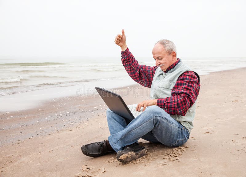 Old Man with Notebook on Beach Stock Photo - Image of office, equipment ...
