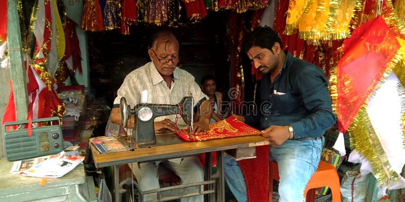 An Old Man Operating Sewing Machine at Workshop Editorial Photo - Image ...