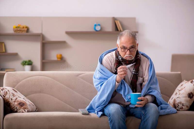 Old man suffering at home stock photo. Image of drinking - 234530104