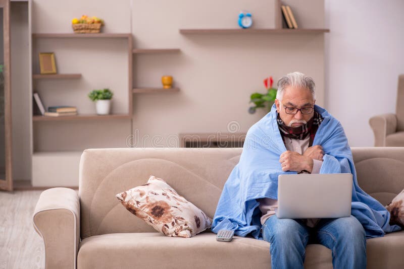 Old man suffering at home stock image. Image of fever - 236619965