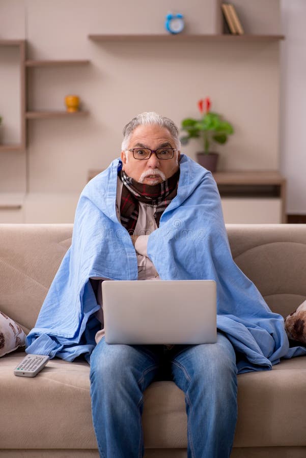 Old man suffering at home stock image. Image of laptop - 238488547
