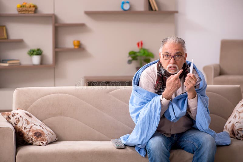 Old man suffering at home stock photo. Image of sneeze - 247147872