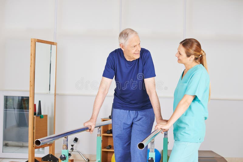 Old man at physiotherapy stock image. Image of profession - 51531769