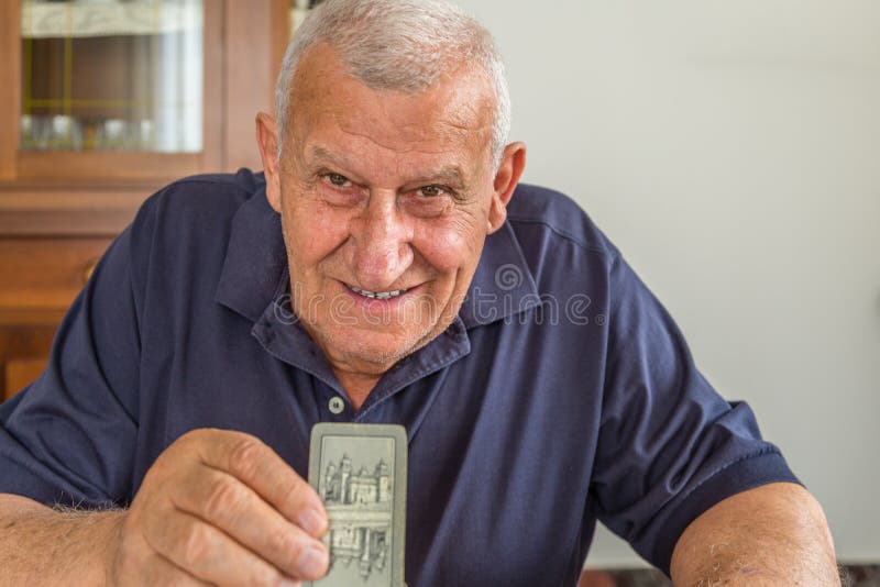Old man playing cards stock image. Image of caucasian - 98658589