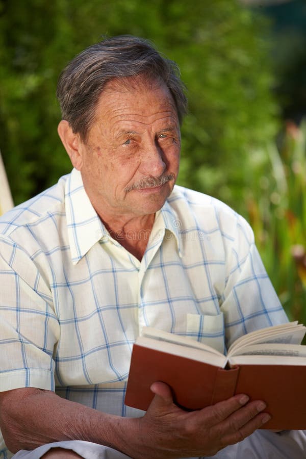 Old man reading book stock photo. Image of home, older - 8503230