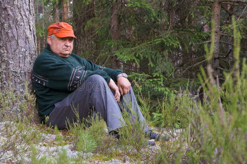 Old Man Resting in a Forest Stock Image - Image of mature, outside ...