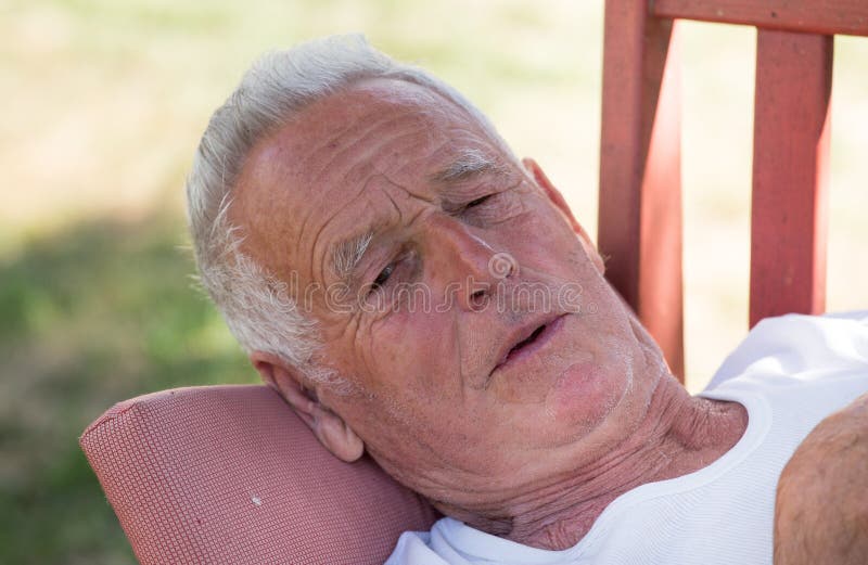 Old man resting in garden stock photo. Image of human - 135611994