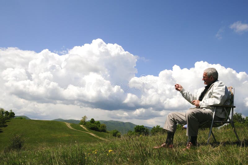 Old Man Resting in the Nature Stock Image - Image of hills, field: 7427045