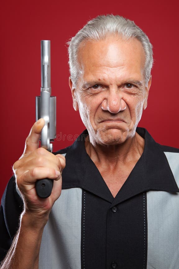 Old Man with a Revolver stock image. Image of angry, male - 20994787