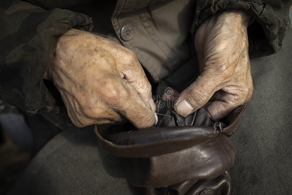Hands working on a boot stock photo. Image of hands, shoes - 29846090