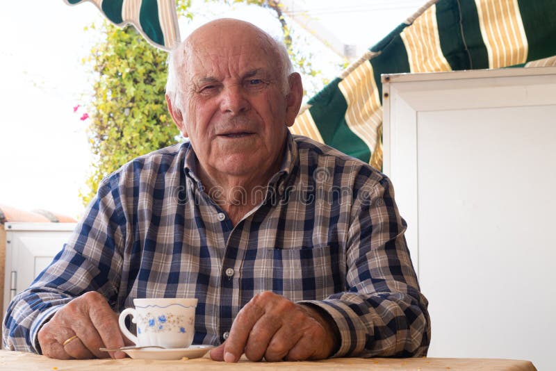 Old Man Sitting with a Cup of Coffee Stock Photo - Image of family ...