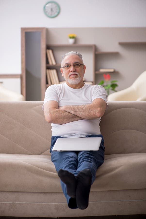 Old man sitting at home stock photo. Image of education - 267966166