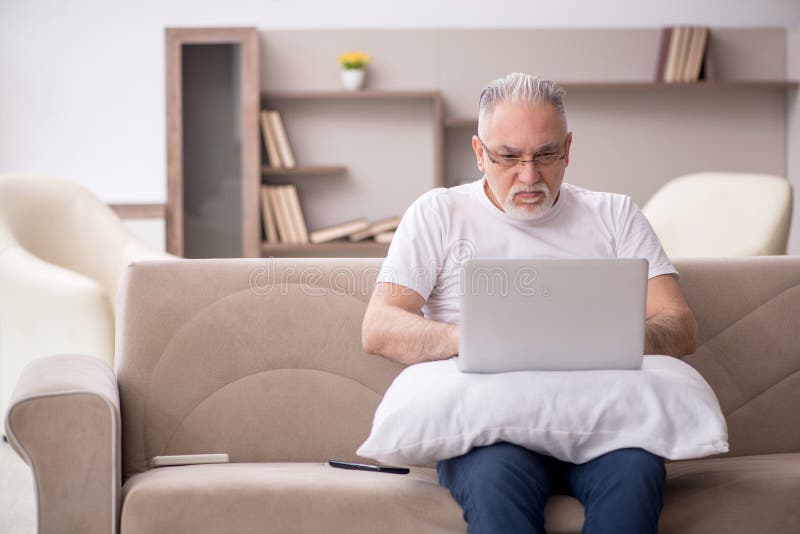 Old man sitting at home stock photo. Image of education - 267966166
