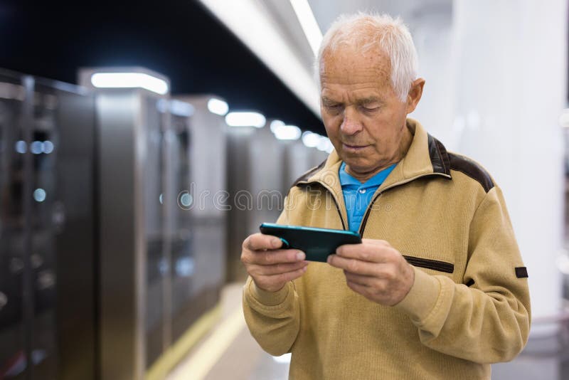 Old Man with Smartphone in Subway Station Stock Photo - Image of ...