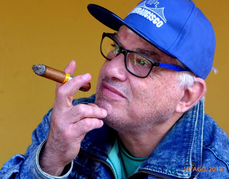 Old Man Smoking a Cuban Cigar Stock Photo - Image of cigar, smoking ...