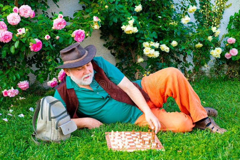 Old Man in Spring Garden with Chess. Hobby Concept. Happy Old Age ...