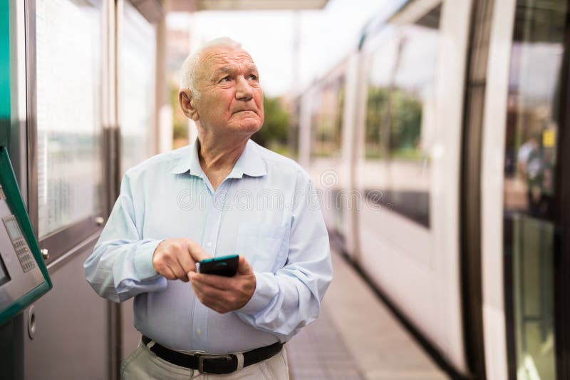 Old Man with Smartphone on Tram Stop Stock Photo - Image of senior ...