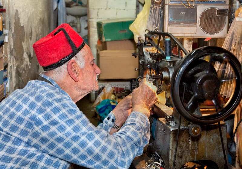 Old Man Stitching in Haifa Souq, Israel. Editorial Photo - Image of ...
