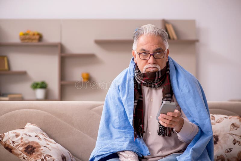 Old man suffering at home stock image. Image of influenza - 252226833