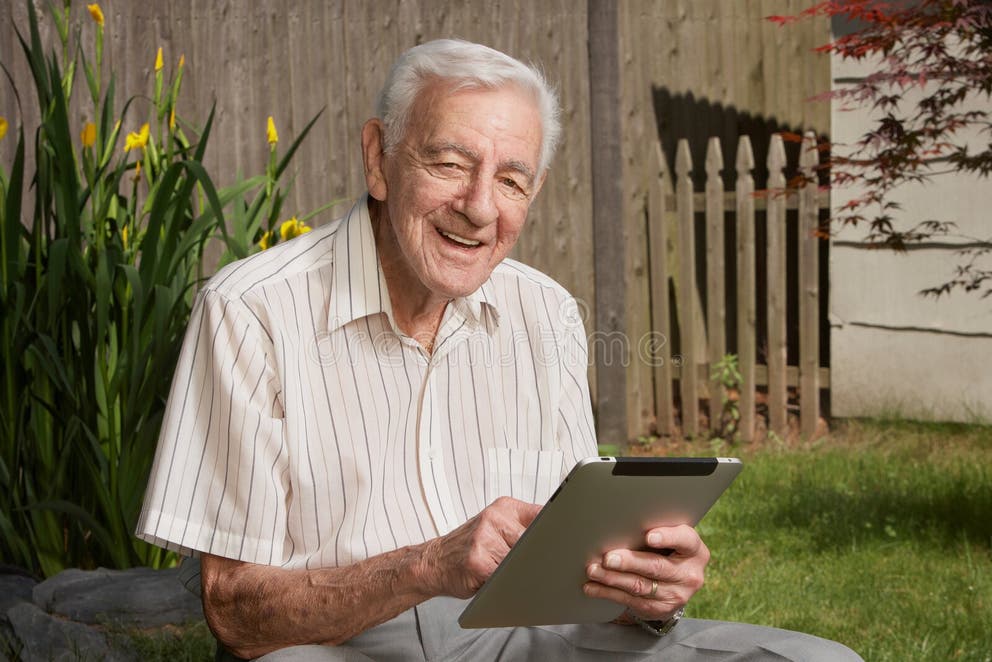 Old Man with Tablet Computer Stock Photo - Image of mobile, outdoors ...