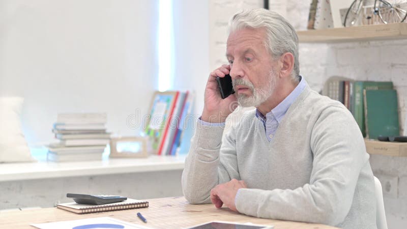 Senior Old Man Talking on Phone at Work Stock Image - Image of ...