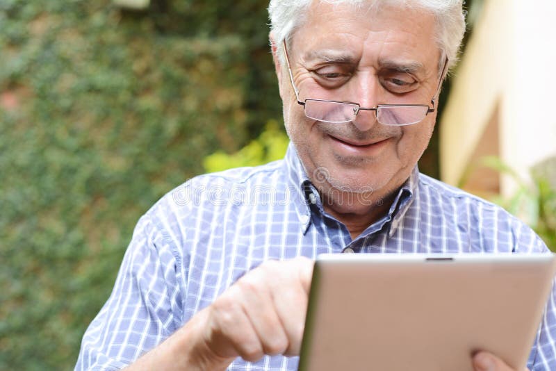 Old Man Using Digital Tablet. Stock Image - Image of caucasian ...