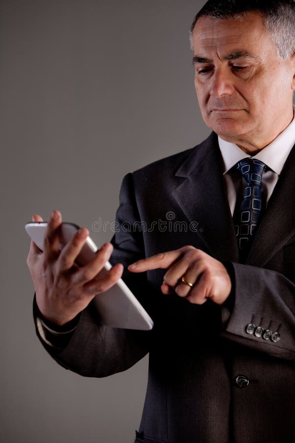 Old Man Using a Digital Tablet Stock Image - Image of black, senior ...