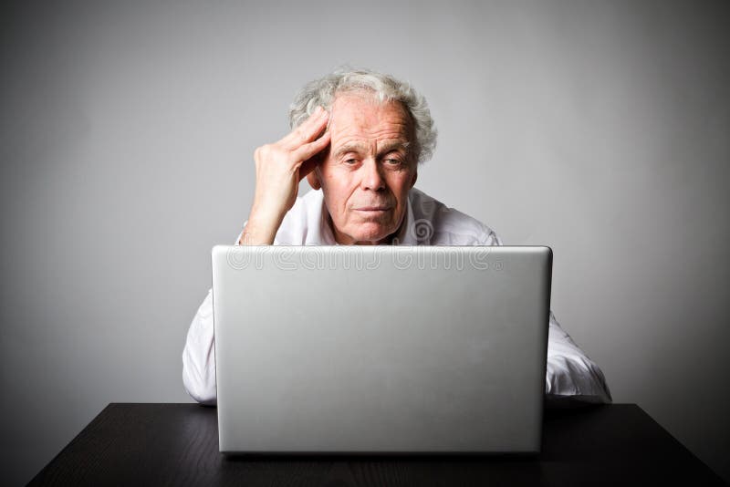 Old man using a laptop stock photo. Image of computer - 109141386 Old man using a laptop stock photo. Image of computer - 109141386