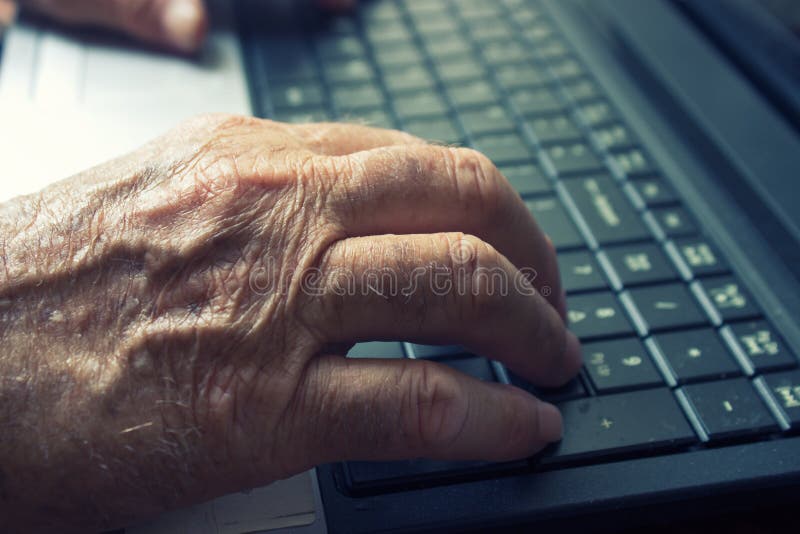 Old man using notebook stock photo. Image of retirement - 73710126