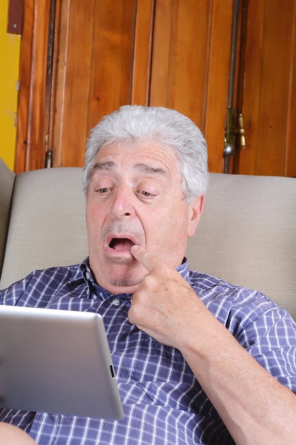 Old man using tablet. stock image. Image of caucasian - 90848089
