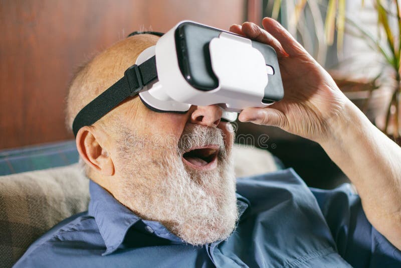 Old Man Using Virtual Reality Goggles at Home Stock Image - Image of ...
