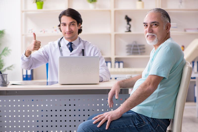 The Old Man Visiting Young Male Doctor Stock Image - Image of ...