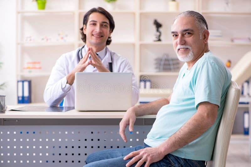 The Old Man Visiting Young Male Doctor Stock Photo - Image of happy ...
