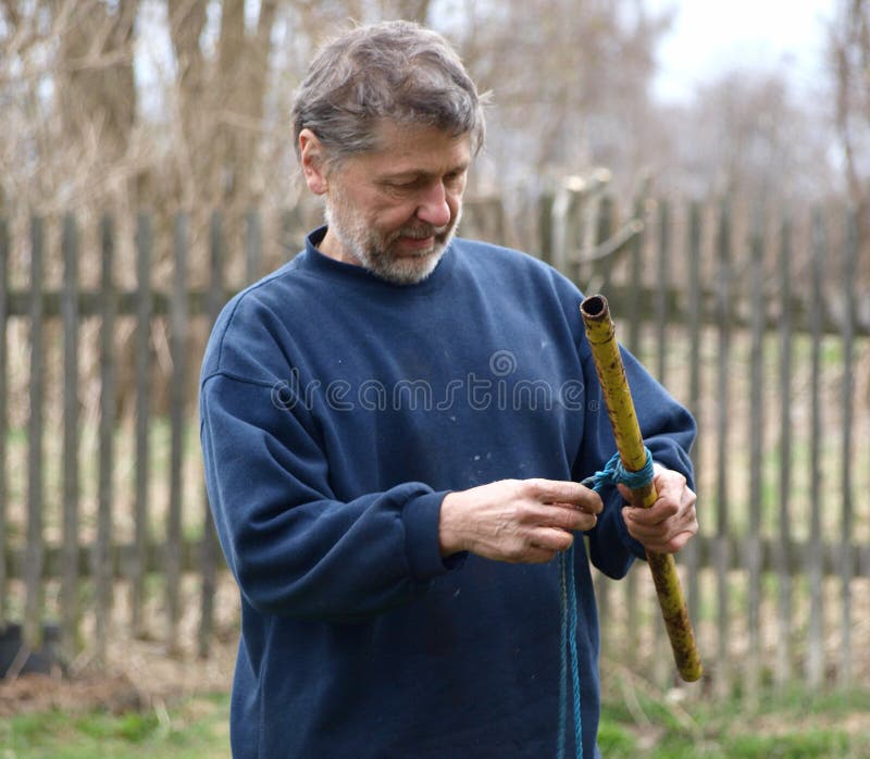 Old man working stock photo. Image of nature, hold, concentration ...