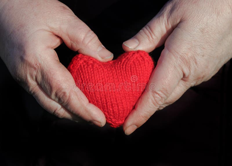 Old Man with Wrinkled Hands with Fingers Knitted Red Heart Stock Image ...